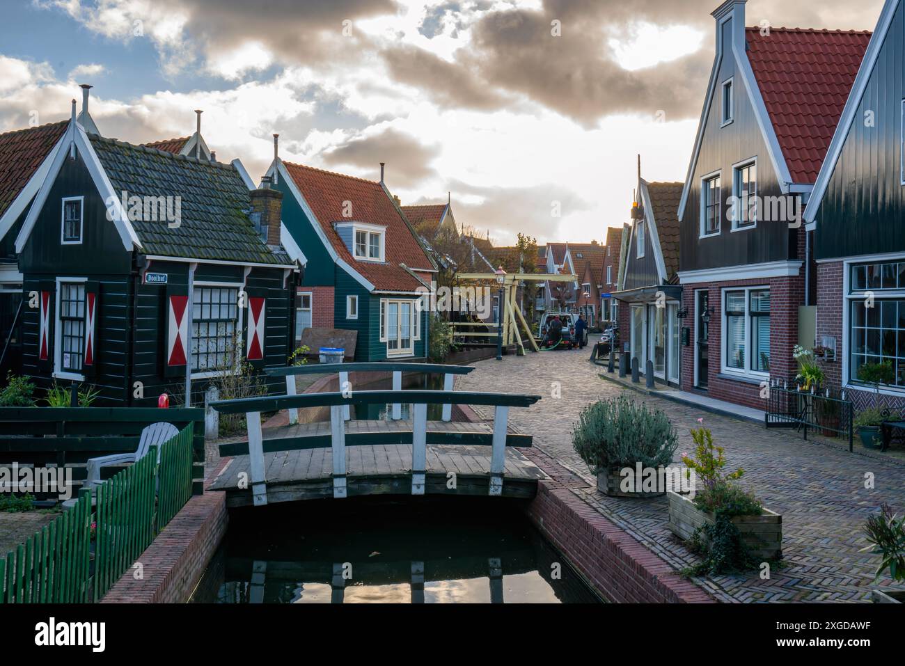 Volendam street with traditional Dutch houses, Volendam, North Holland ...