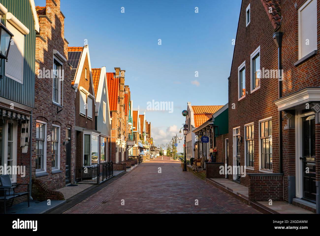 Volendam street with traditional Dutch houses, Volendam, North Holland ...