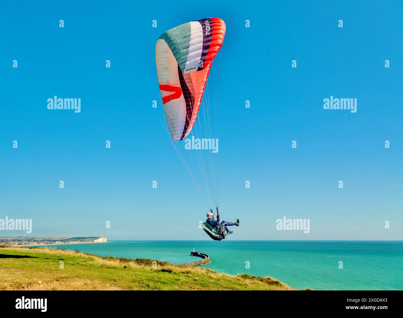 Paraglider taking off above the harbour at Newhaven, East Sussex ...