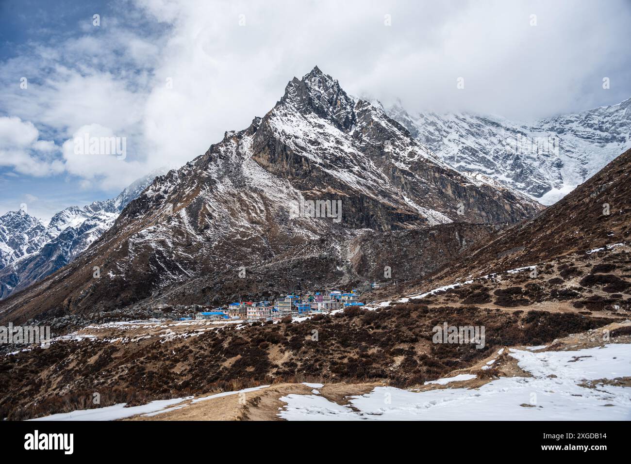 Colorful village at the foot of Langtang Lirung, high altitude mountains of Langtang Valley Trek ...