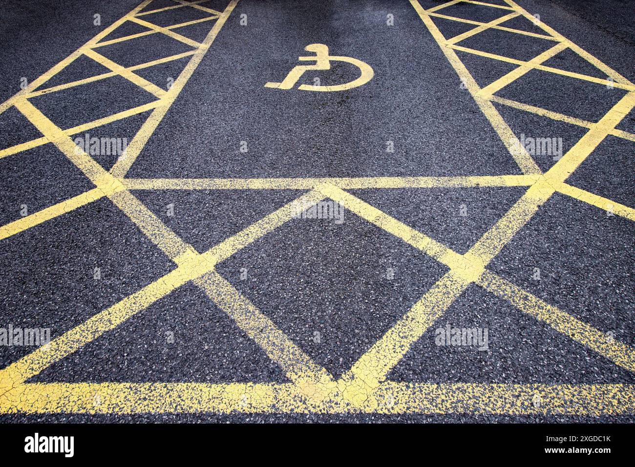 Parking space for wheelchair users or disabled people only, painted on ...