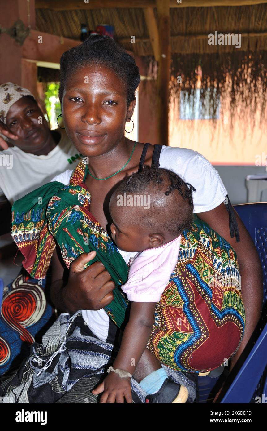 Mother and baby girl, New Mambone, Inhambane, Mozambique Stock Photo ...