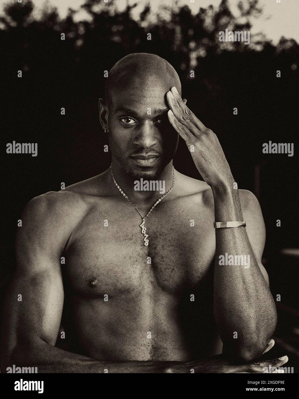 Kevin Young, world record holder and Olympic Gold medalist in the 400 ...