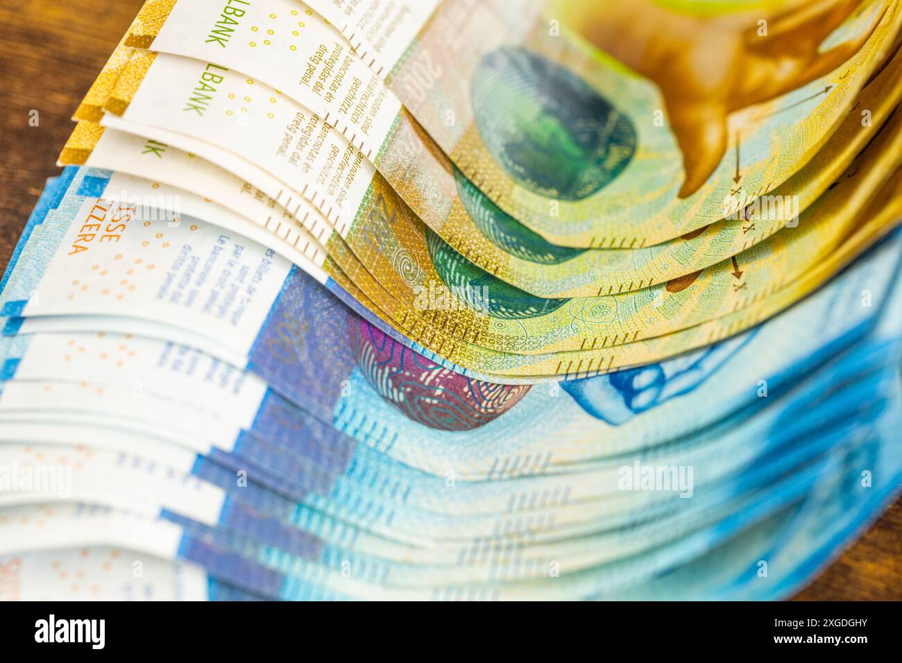 Switzerland money, Bundle of 100 and 200 Swiss francs banknotes ...