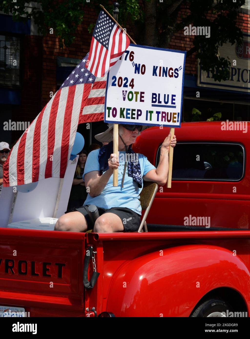 An American Democratic Party supporter holds an anti-Donald Trump sign ...