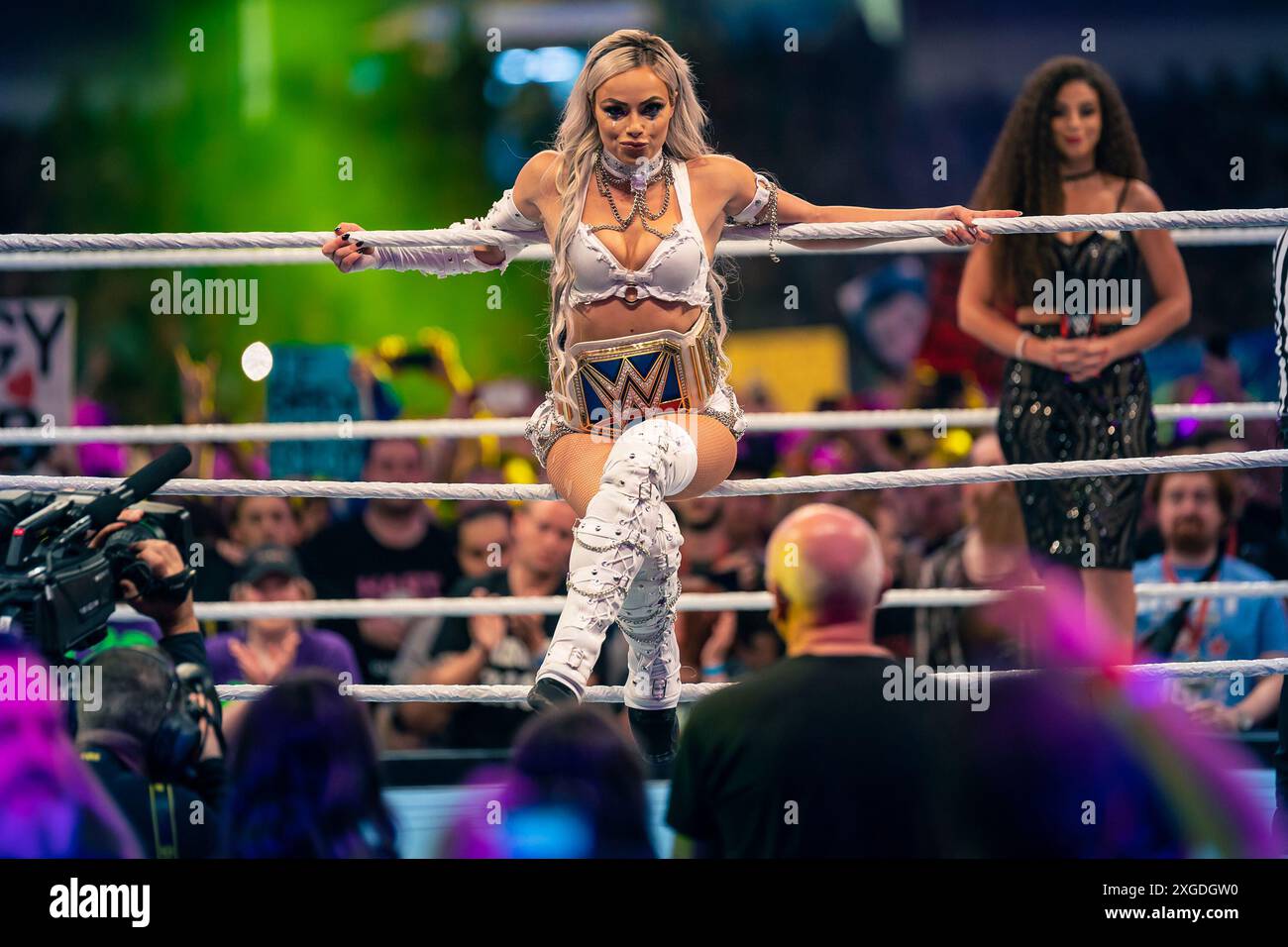WWE Superstar Liv Morgan posing with the Women's Championship at WWE ...