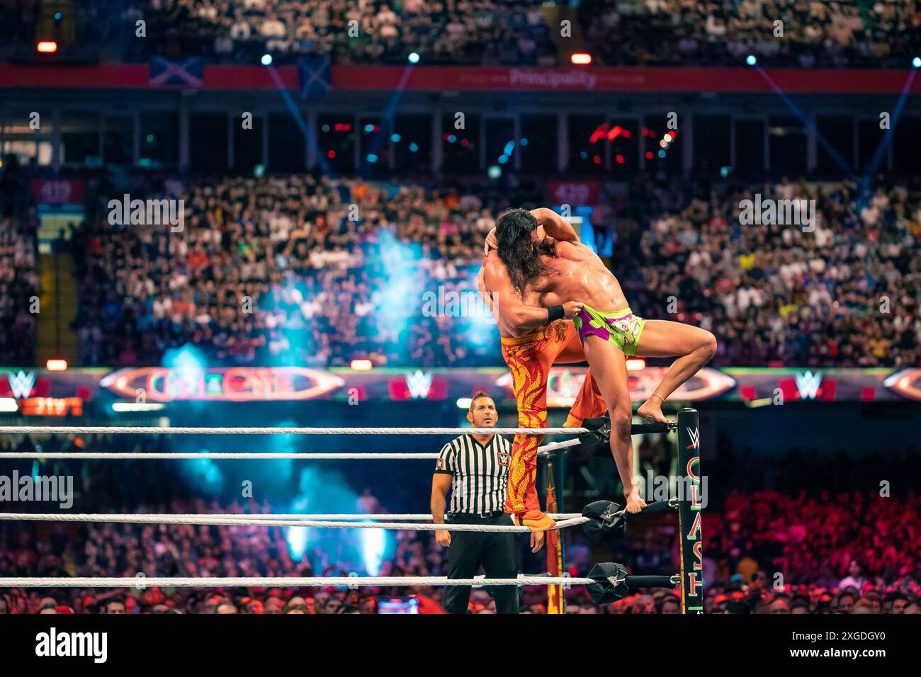 WWE Superstars Seth Rollins & Matt Riddle grappling at WWE Clash at The Castle at Principality ...