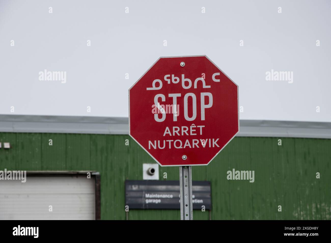 Multilingual stop sign in English, French, Inuktitut and Inuinnaqtun at ...