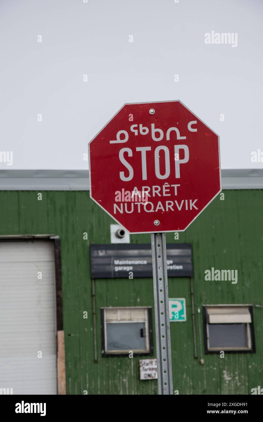 Multilingual stop sign in English, French, Inuktitut and Inuinnaqtun at ...