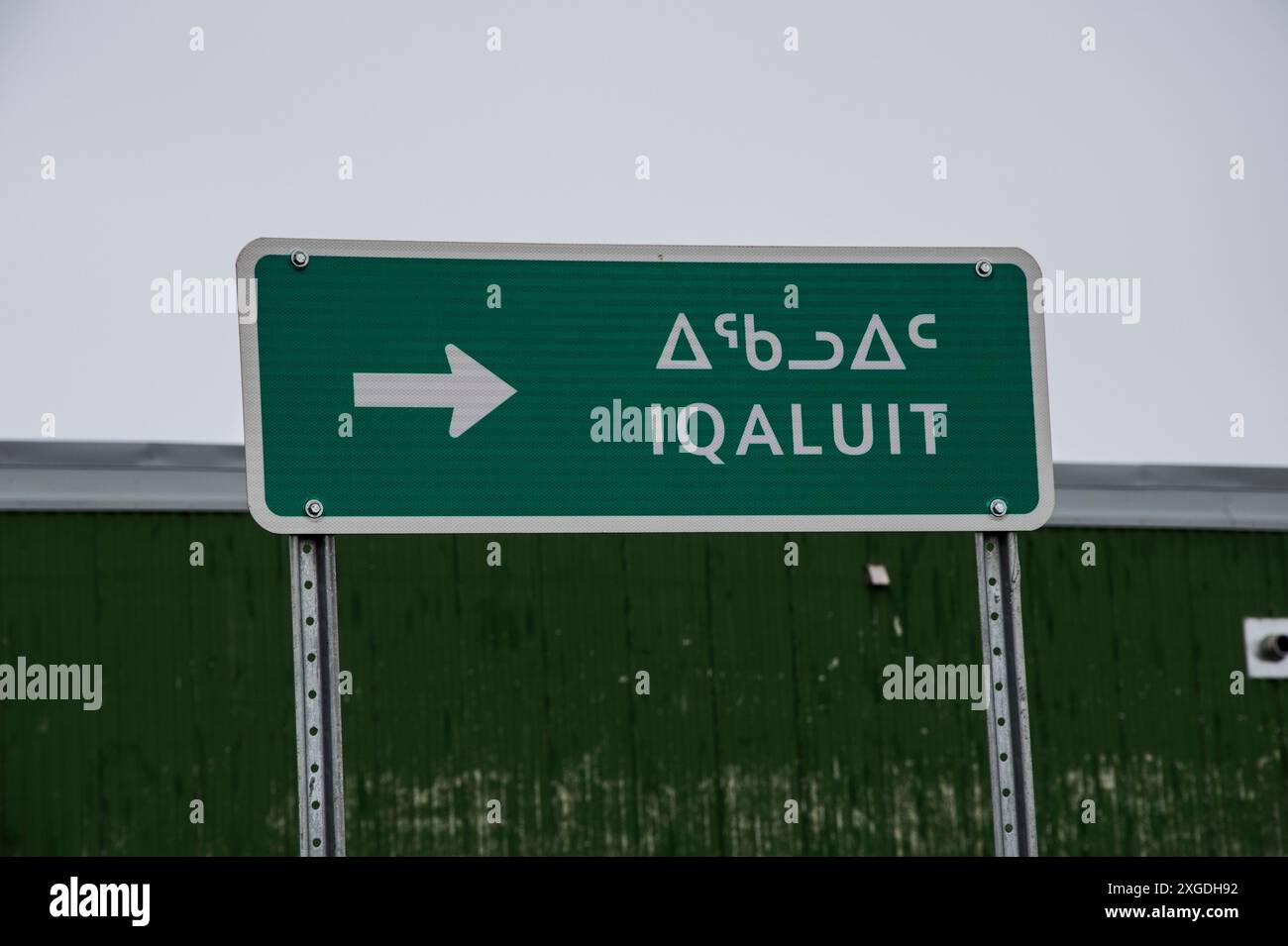 Bilingual directional sign in English and Inuktitut to Iqaluit at ...