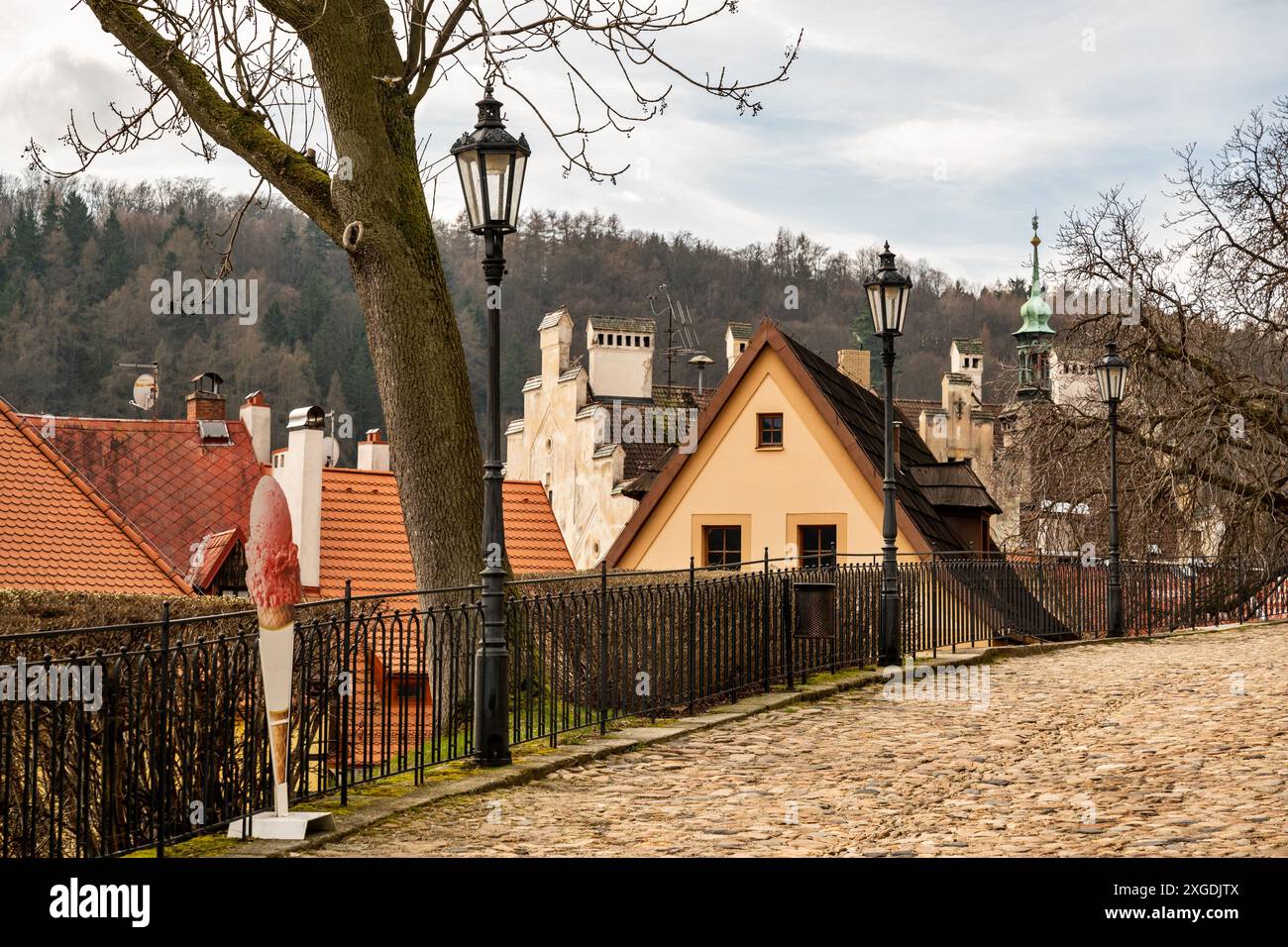 Walk along historical street under castle, urban conservation area ...