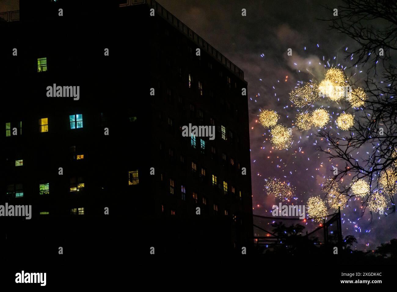 Macy’s Fourth of July Fireworks display seen behind the Elliot Houses ...