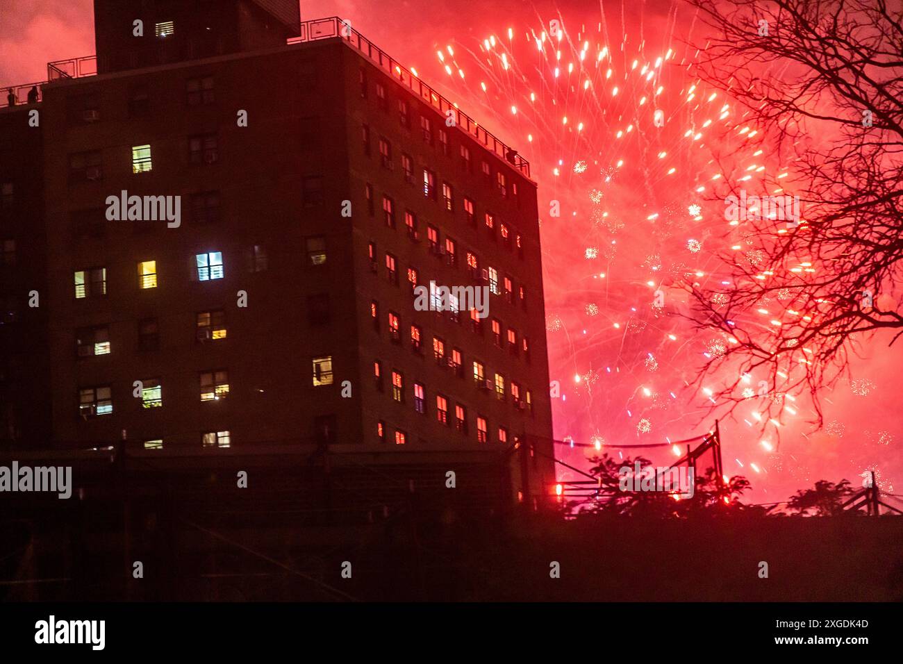 Macy’s Fourth of July Fireworks display seen behind the Elliot Houses ...