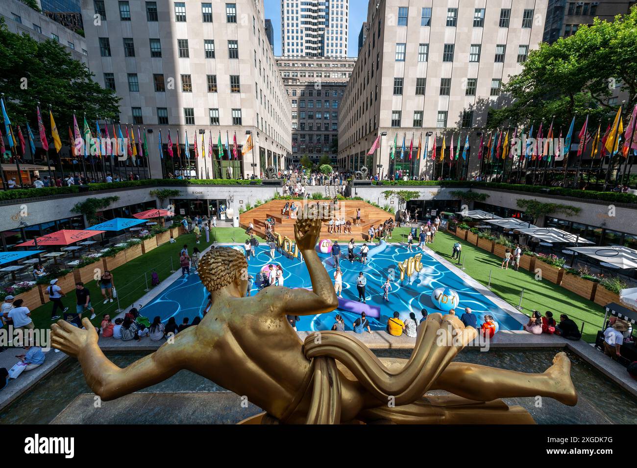 Visitors to Rockefeller Center participate in the interactive “Pool ...