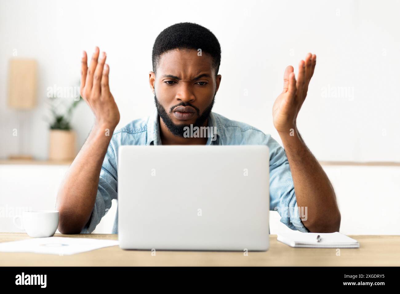 Man solving laptop issues hi-res stock photography and images - Alamy