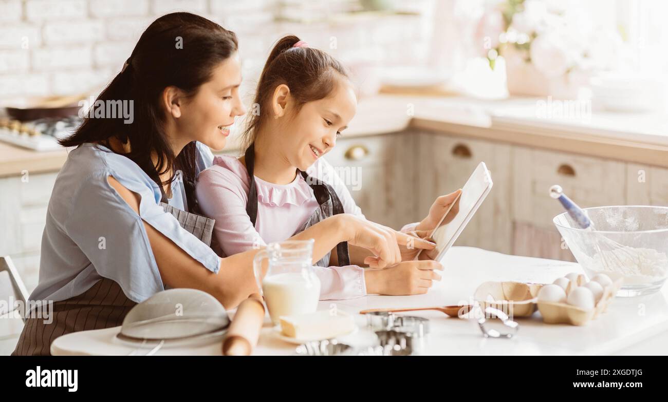 Mother and Daughter Baking Together in a Modern Kitchen Stock Photo - Alamy