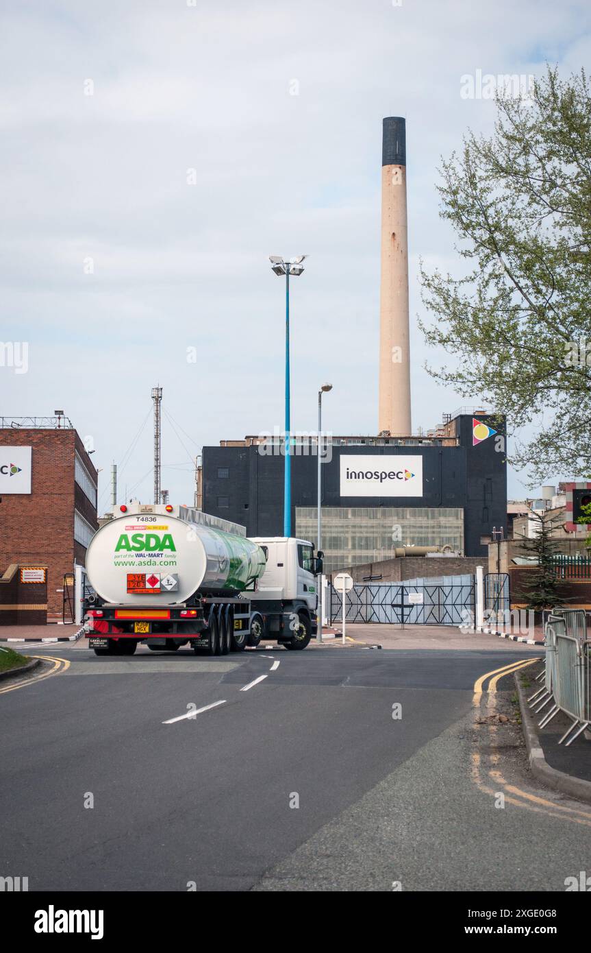 Petrochemical industry. A petrol tanker passing by the Innospec fuel ...