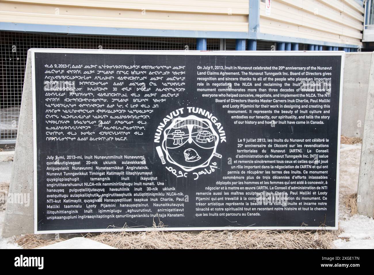 Sign providing information on the Inuit sculpture monument at the Four ...
