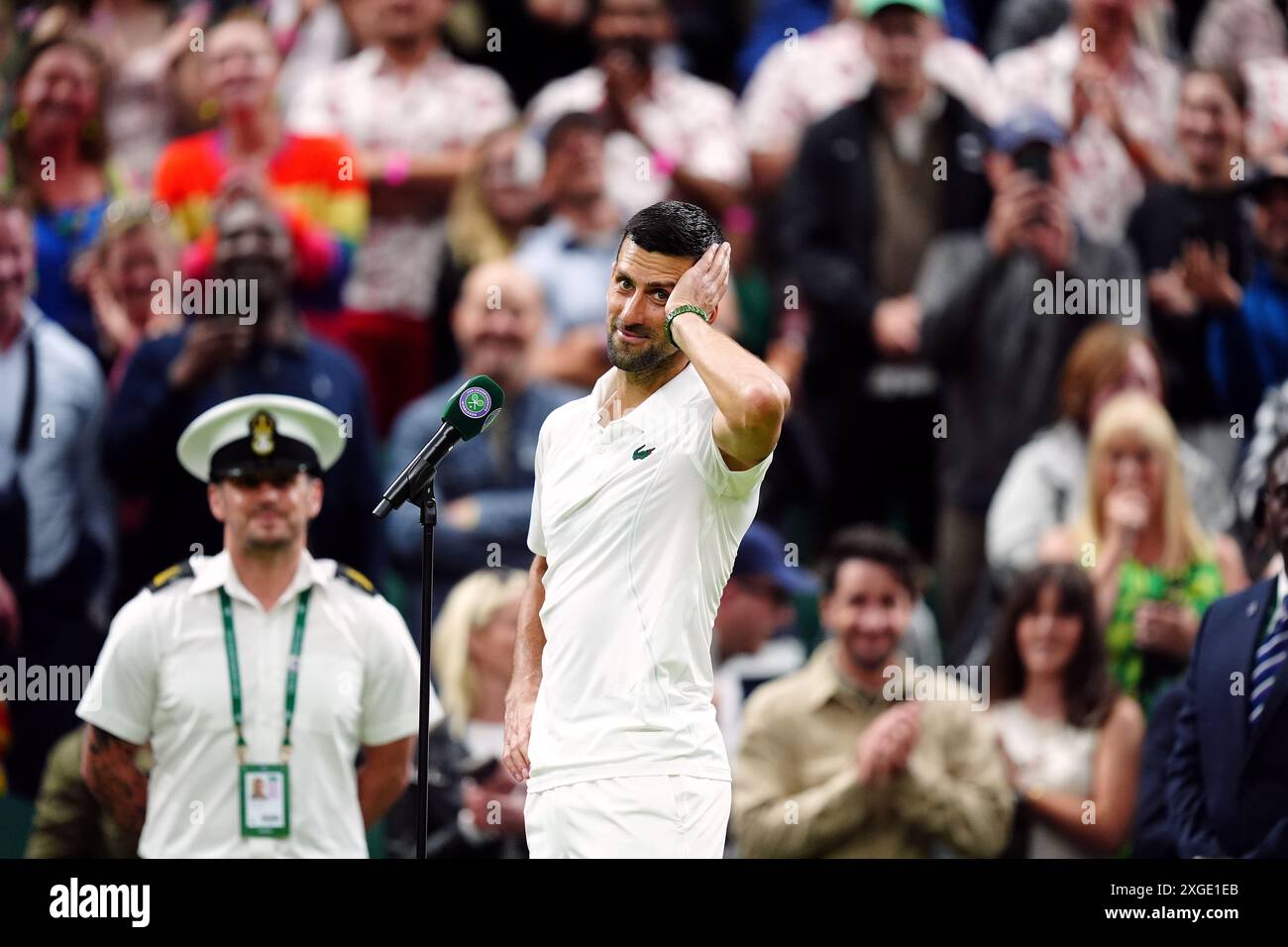 Novak Djokovic is interviewed on court after beating Holger Rune on day eight of the 2024 ...