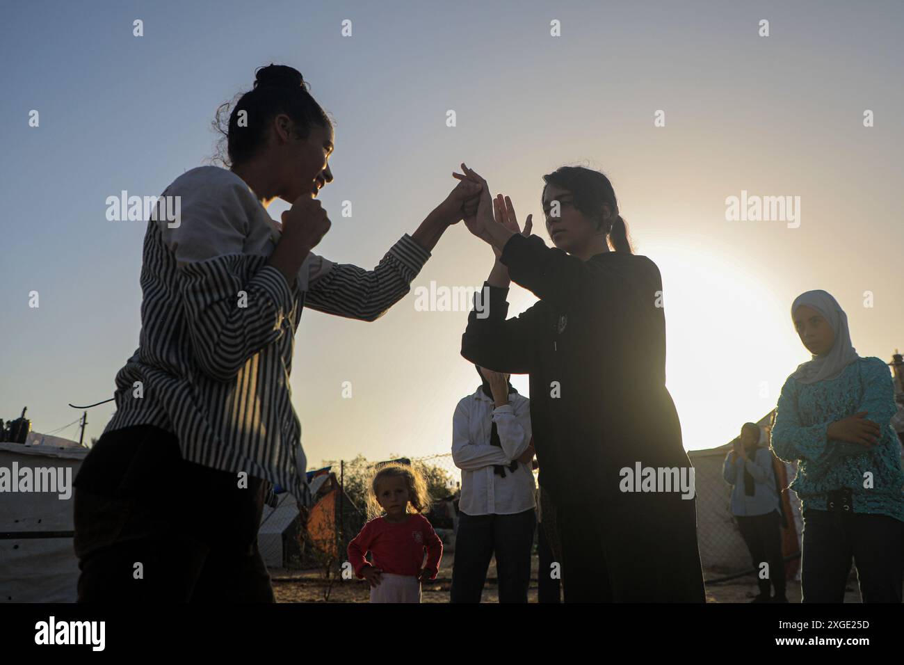 Gaza. 5th July, 2024. Palestinian boxer Halla Ayoub (R, Front) attends ...