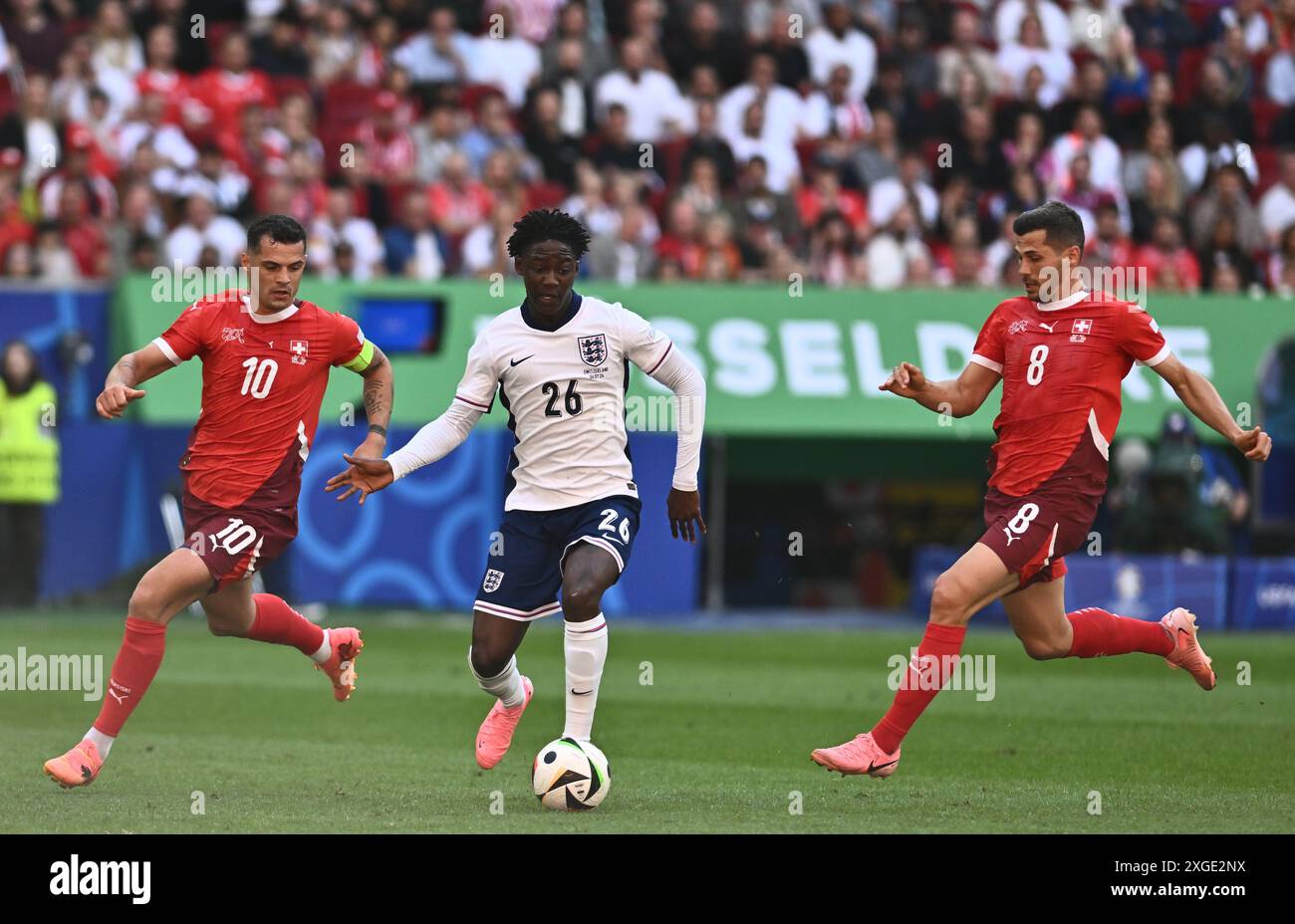 DUSSELDORF, GERMANY - JULY 6: Kobbie Mainoo of England and Granit Xhaka ...