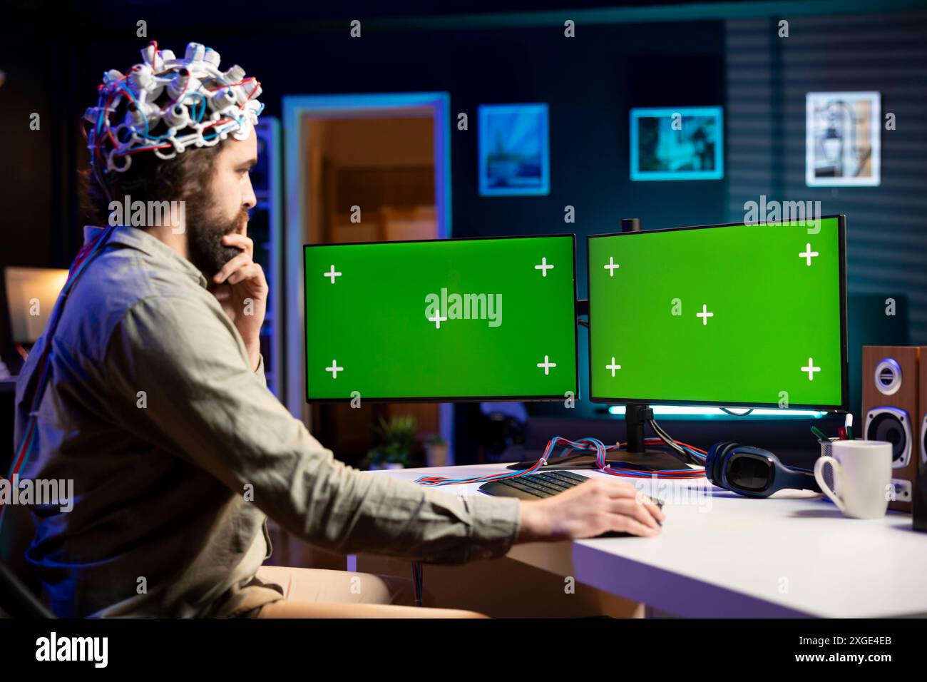 Man With Eeg Headset Programs Brain Transfer Into Multimonitor Setup