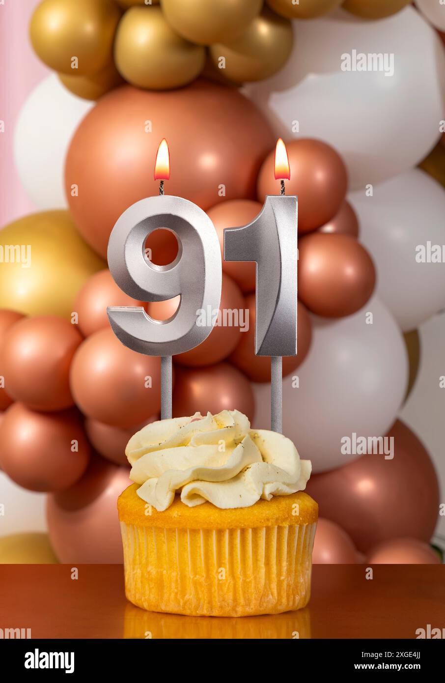 Cupcake with birthday candle on balloons background - Number 91 Stock ...
