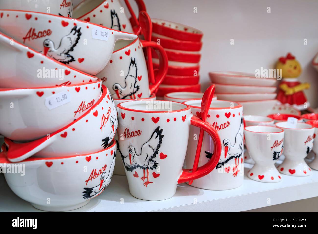 Strasbourg, France - June 2 2023: Ceramic mugs with traditional Alsatian designs with storks on ...