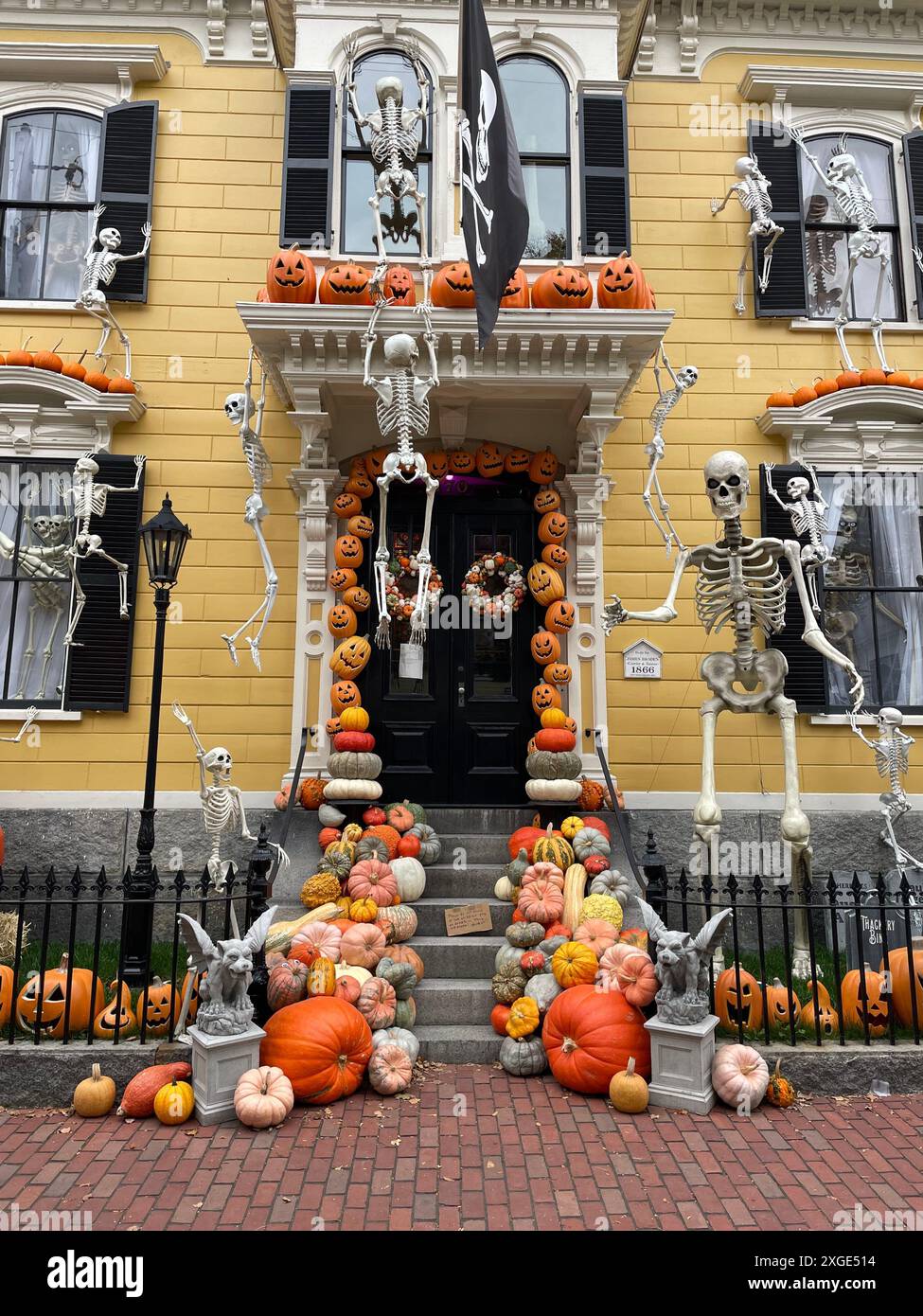 A historic home in Salem Massachusetts is decorated with skeletons and ...