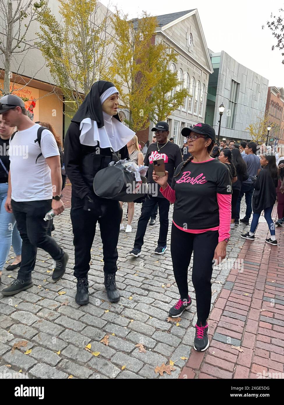 People dress in fun costumes as they parade through the streets of ...