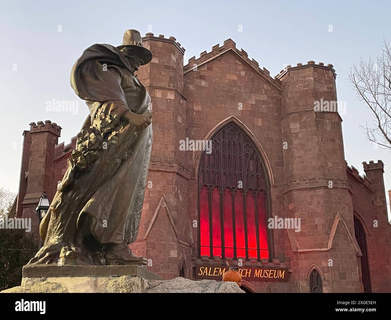 A sculpture of Roger Conant, the founder of the city, stands in front ...