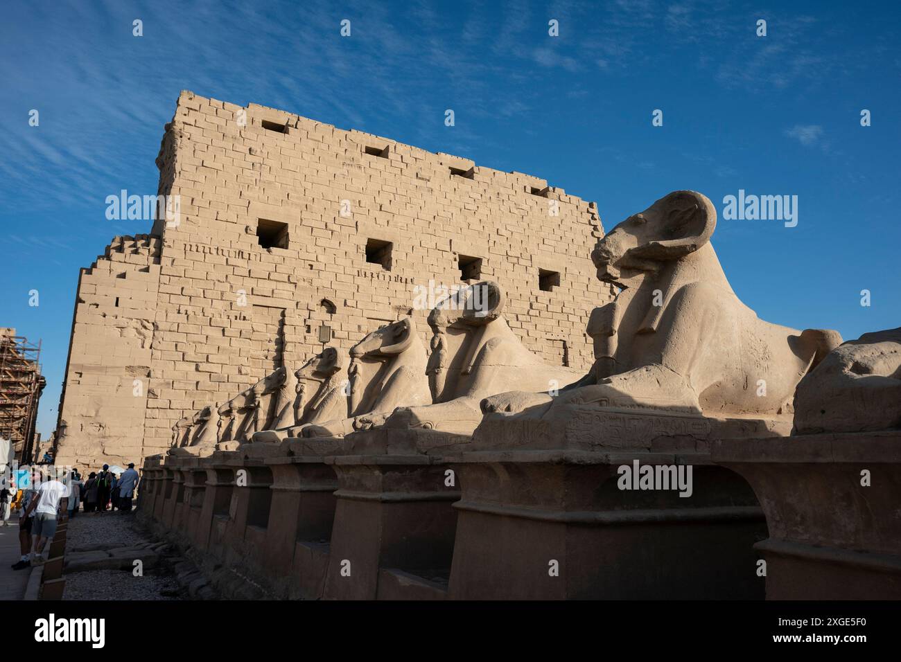 Visitors stroll through the famed Karnack Temple in Egypt Stock Photo ...