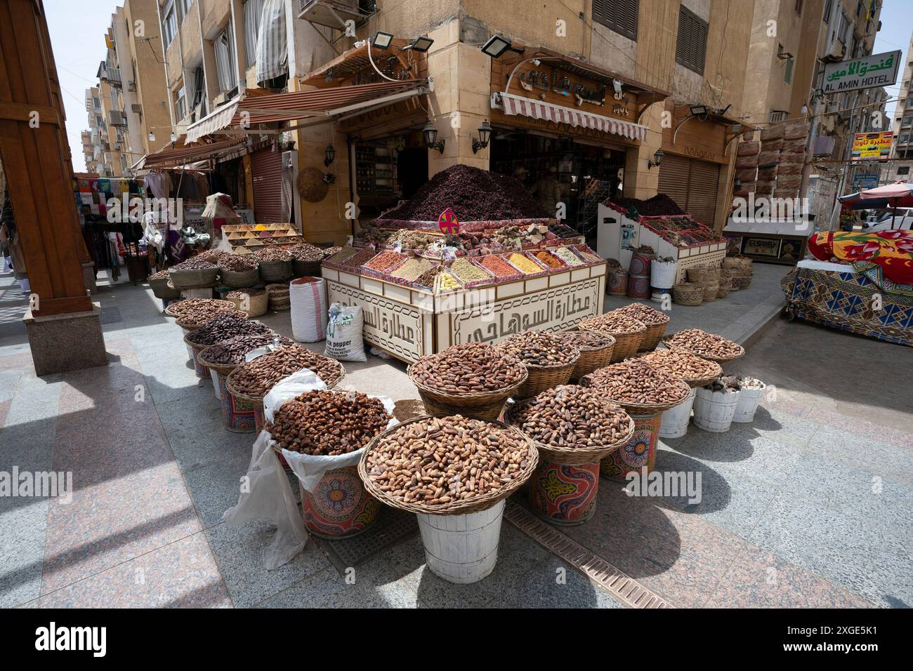 Spices and various nuts beckon shoppers in the Aswan, Egypt bazaar ...
