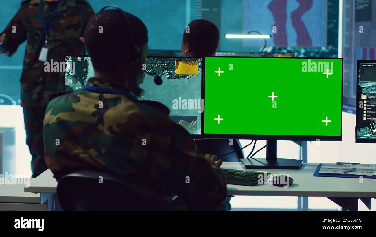 Control room operator tracking all ships anchoring along the coast line ...