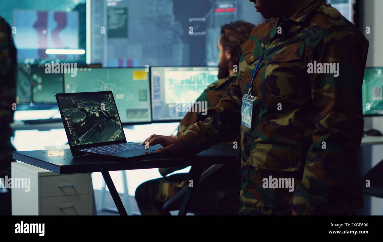 Navy operations specialist examines ships along the coast line to ...