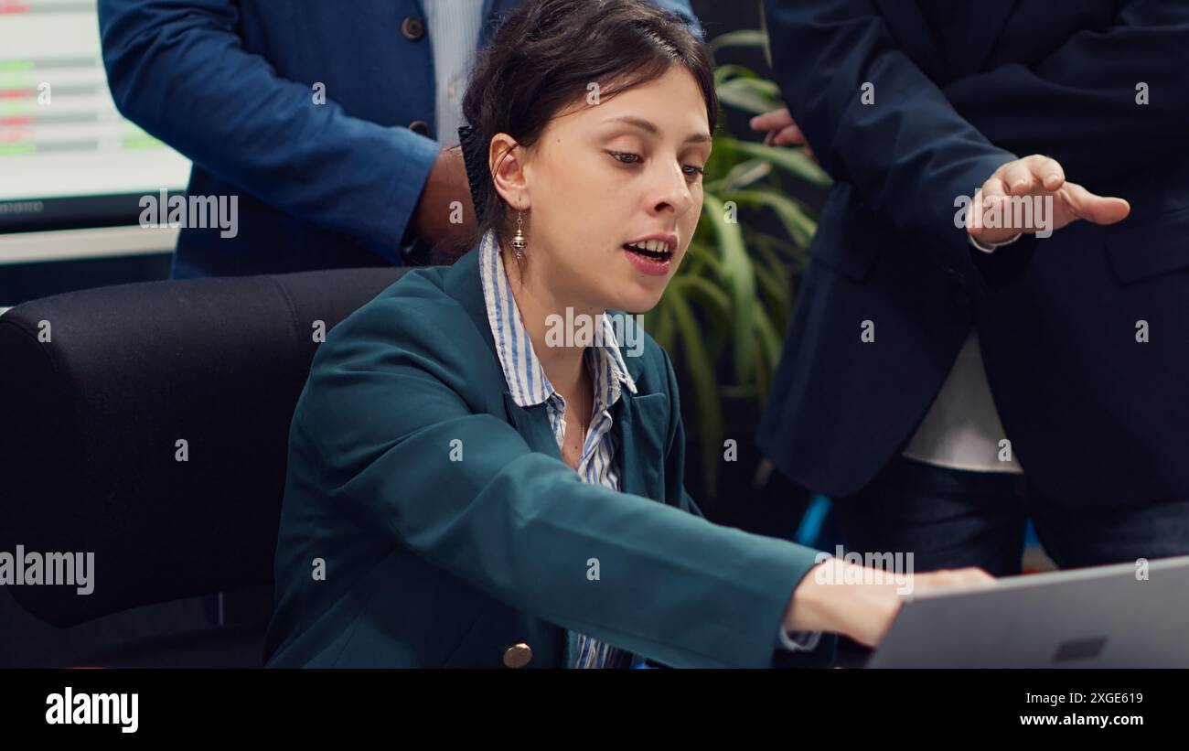 Frustrated angry project manager acting crazy and judging her staff ...