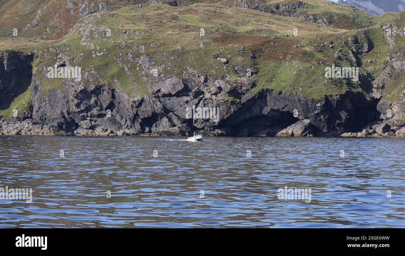 Inshore fishing Ireland white insore fishing boat outboard motor rocky ...