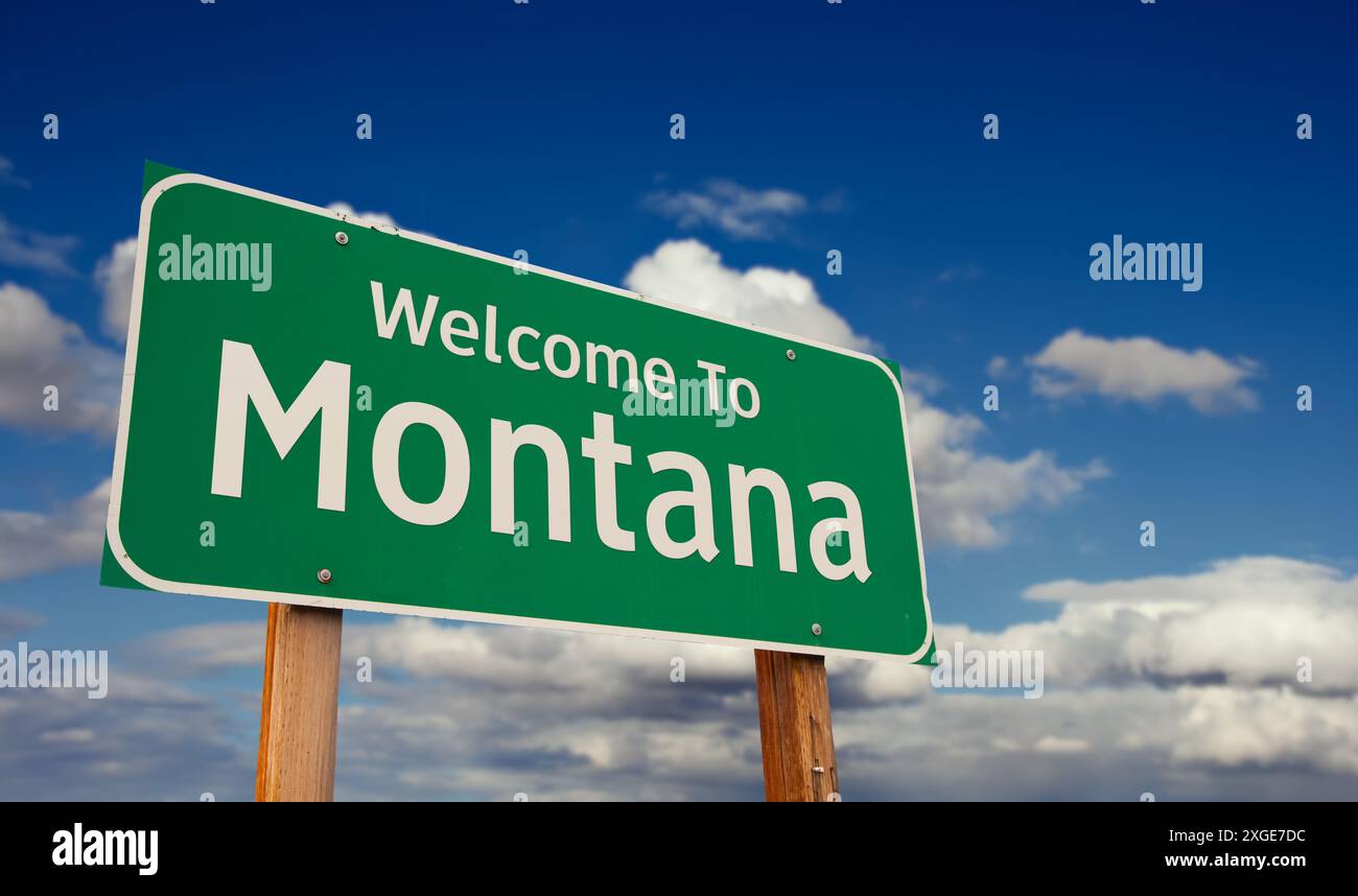 Welcome To Montana Green Road Sign Over Blue Sky with Some Clouds Stock ...