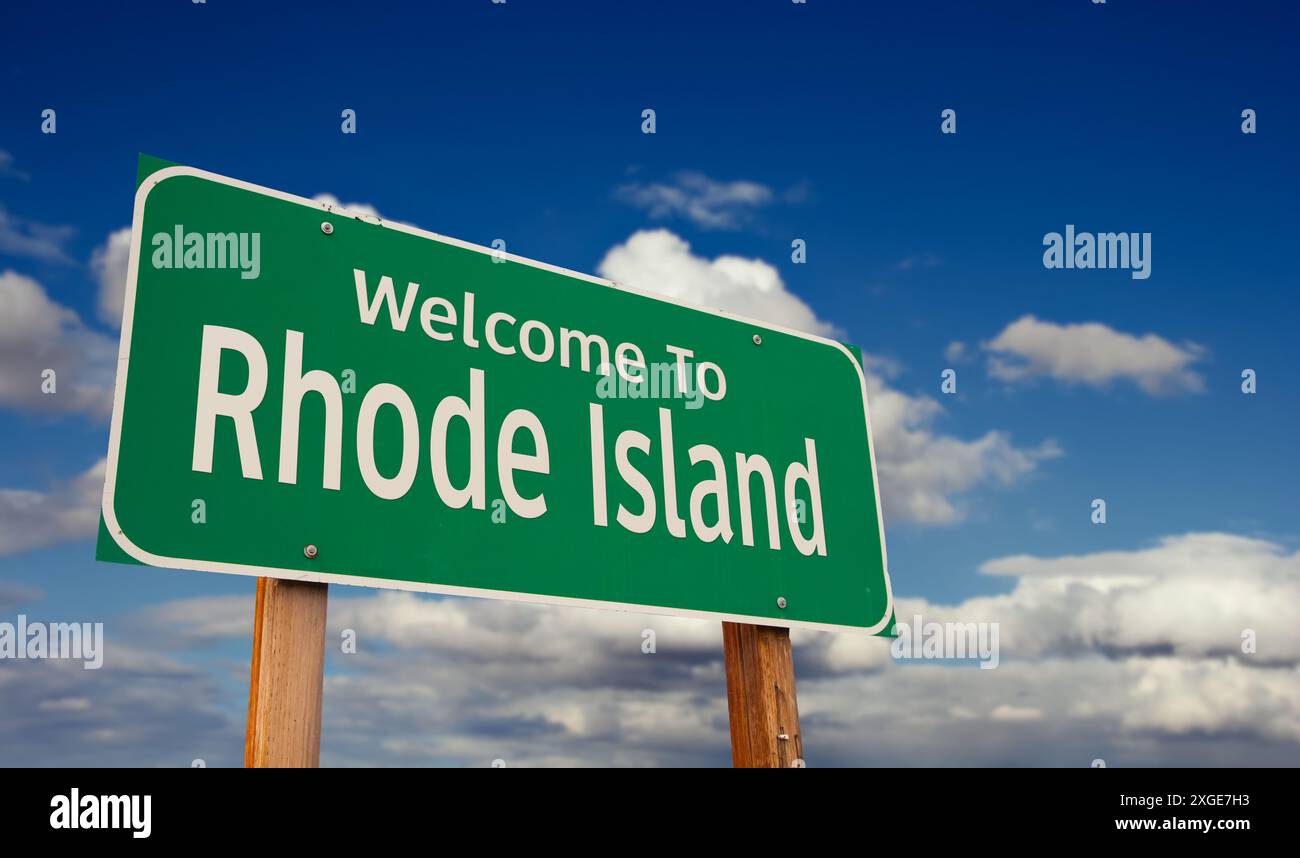 Welcome To Rhode Island Green Road Sign Over Blue Sky with Some Clouds ...