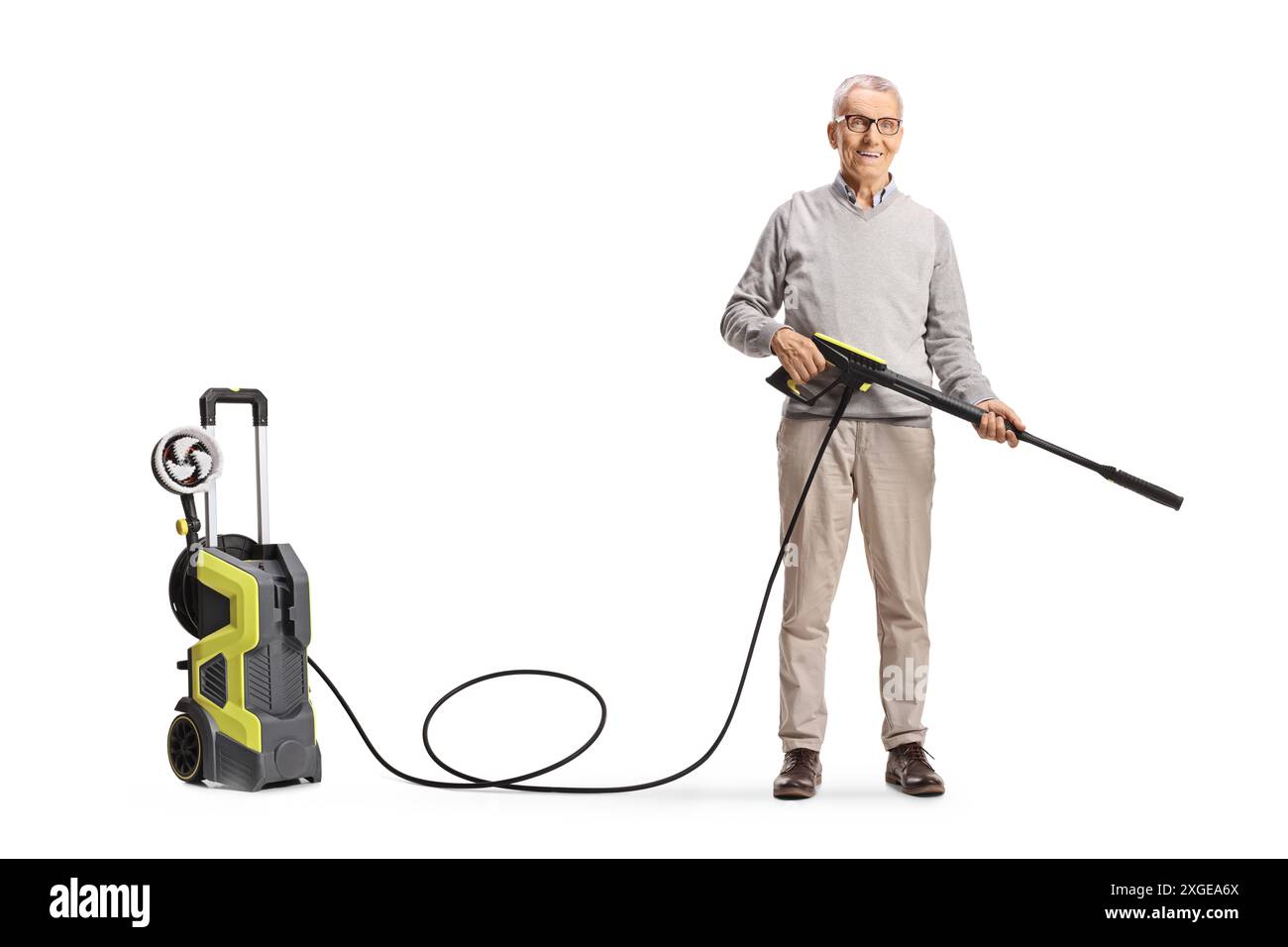 Senior man with high pressure washer machine isolated on white ...
