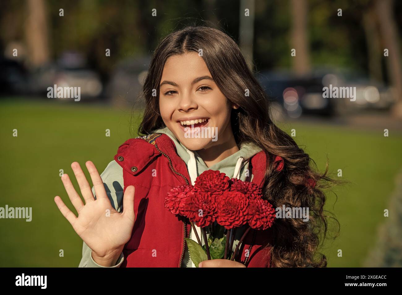 teen girl with fall flowers outside, hellow. photo of teen girl with ...