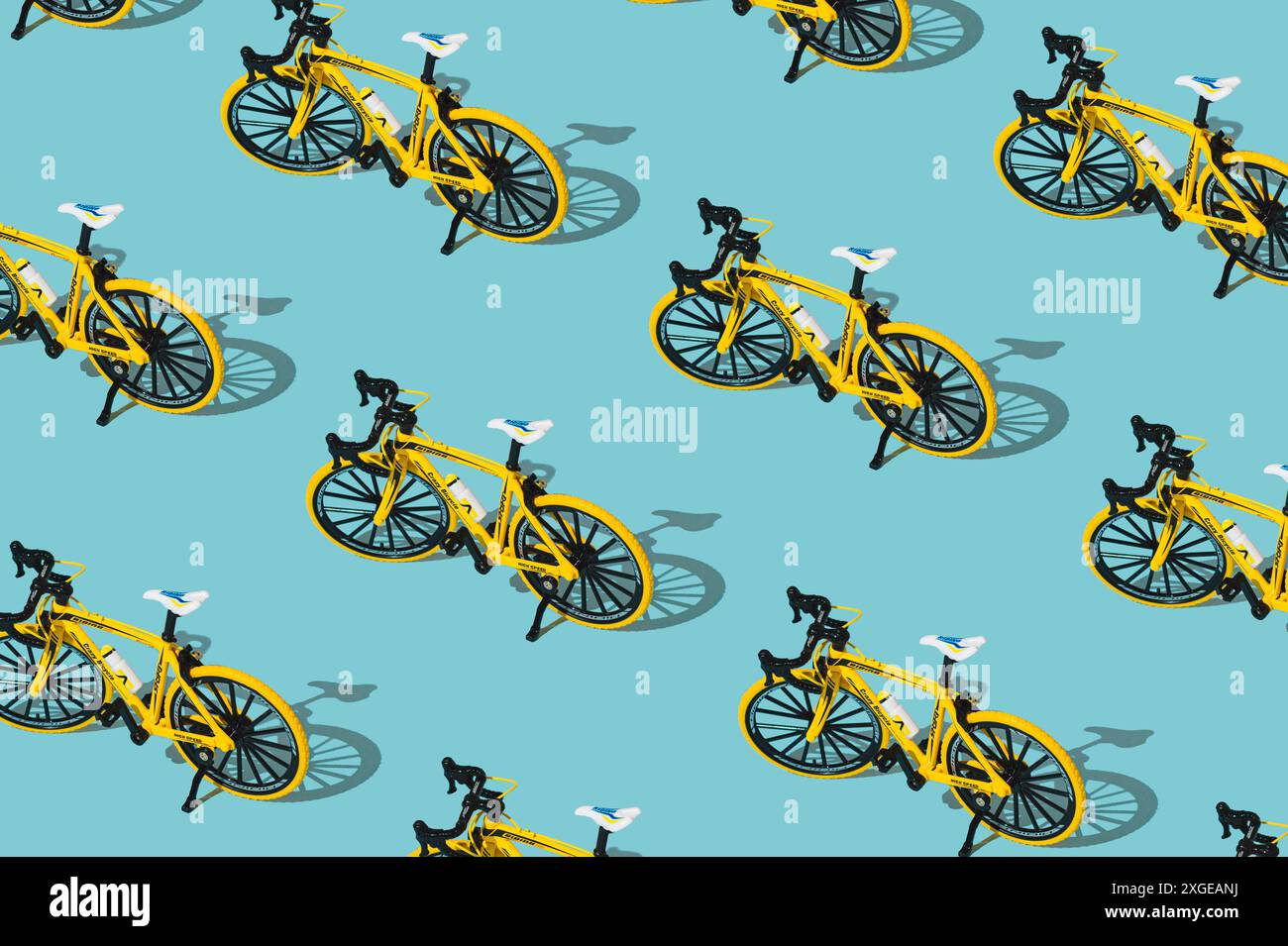 Trendy sport pattern made of yellow bicycle on pastel blue background ...