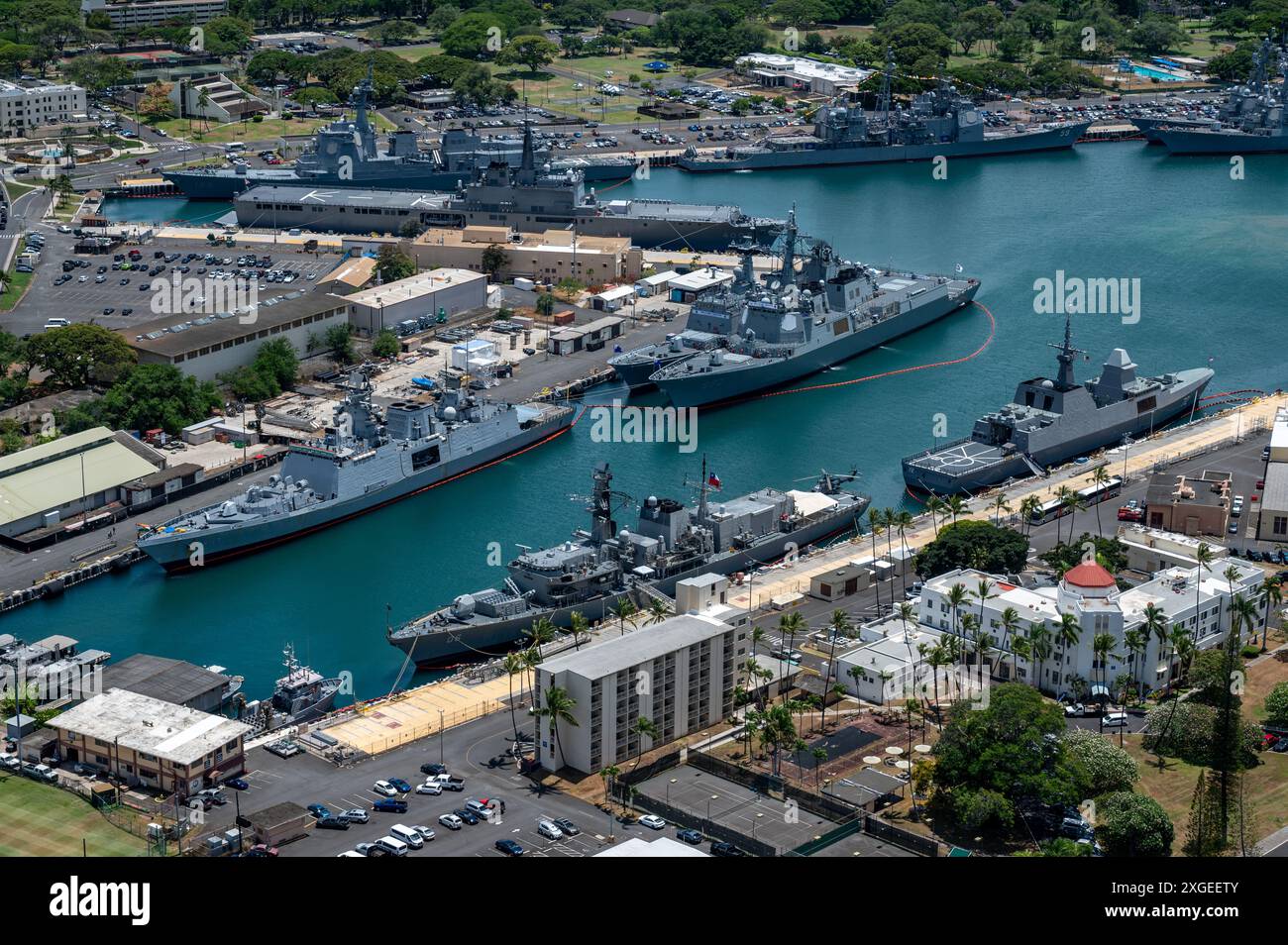 An aerial view of ships from multiple nations moored at Joint Base ...