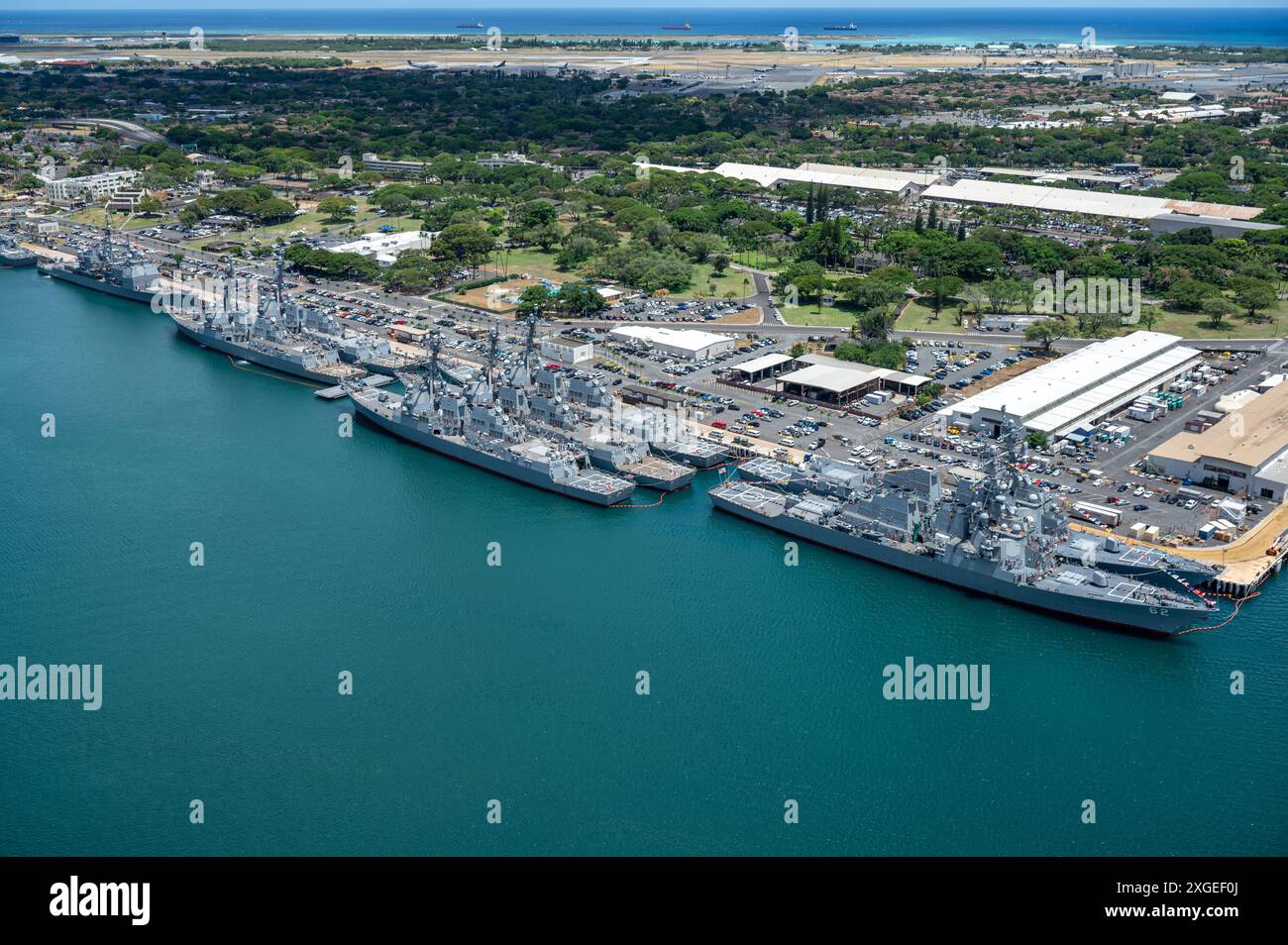 An aerial view of U.S. Navy ships moored at Joint Base Pearl Harbor ...