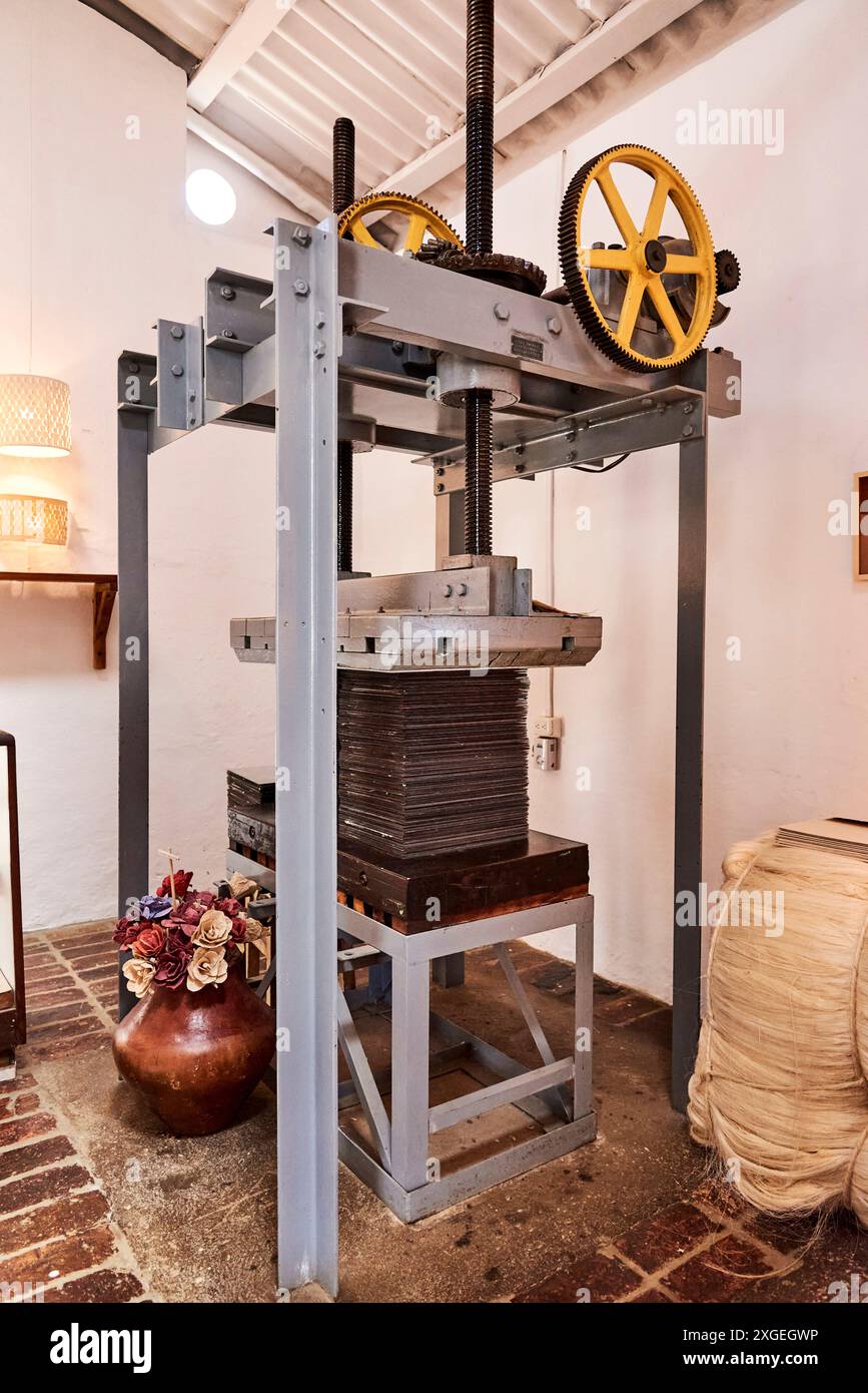Press used in papermaking, machine used in a craft manufacturing paper ...