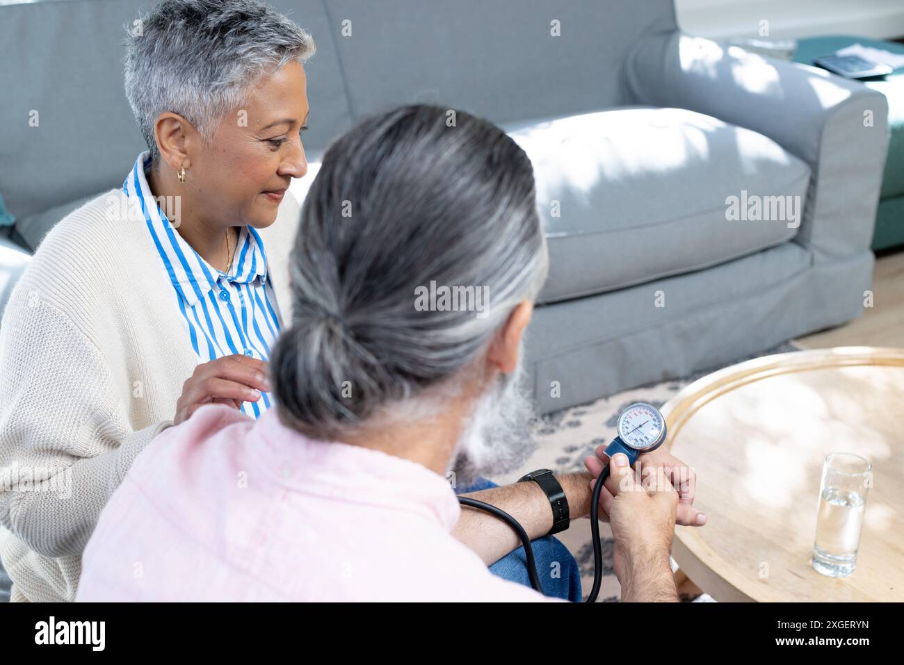 Monitoring senior couple measuring hi-res stock photography and images ...