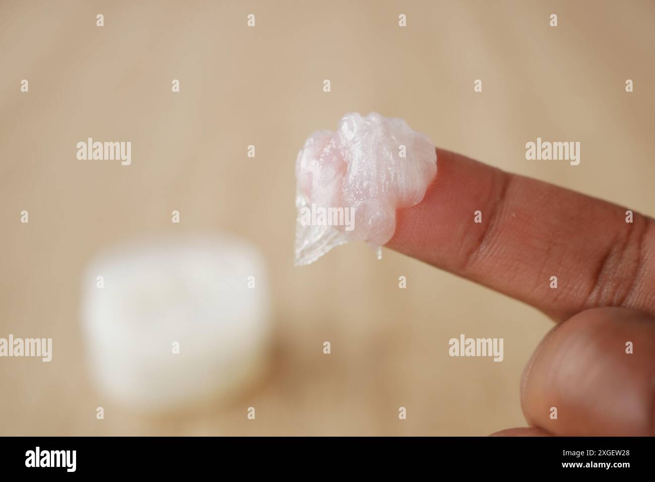 Man hand applying petroleum jelly hi-res stock photography and images ...