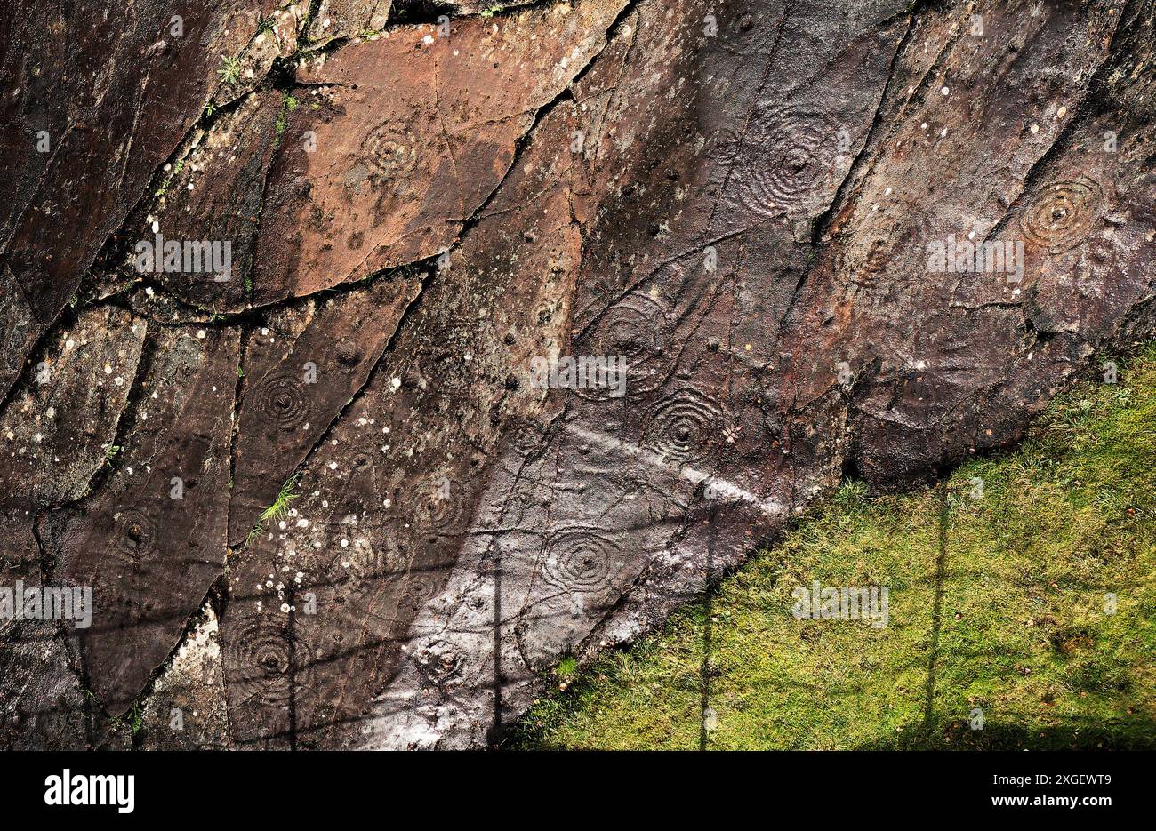 Cup and ring marks prehistoric Neolithic rock art on natural rock ...