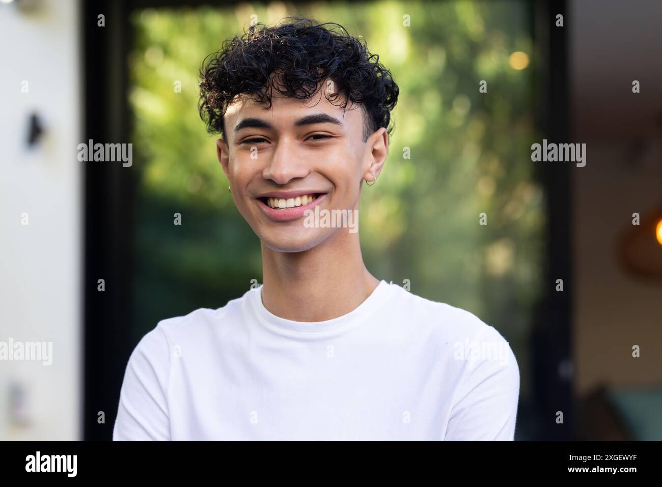 Positive man in white shirt hi-res stock photography and images - Alamy