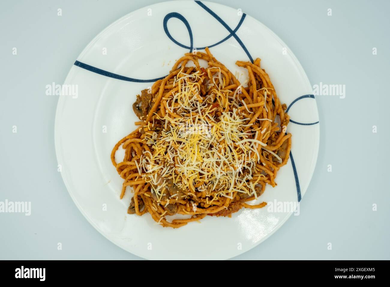 Philippine Sweet Spaghetti with Cheese on top and hotdogs Stock Photo ...